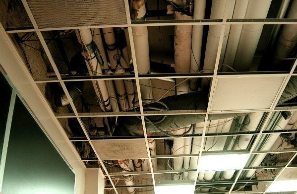 Seamless Integration: Concealing Wires and Pipes with Suspended Ceilin